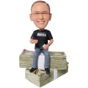 Custom bobblehead sitting on dollars money - Bbobbler